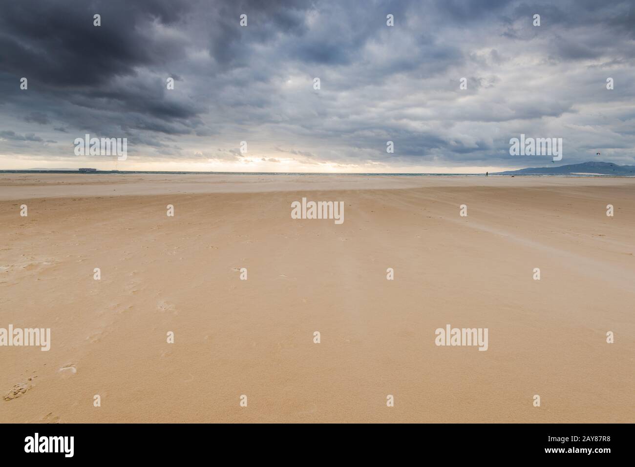 Dark clouds over sand hi-res stock photography and images - Alamy