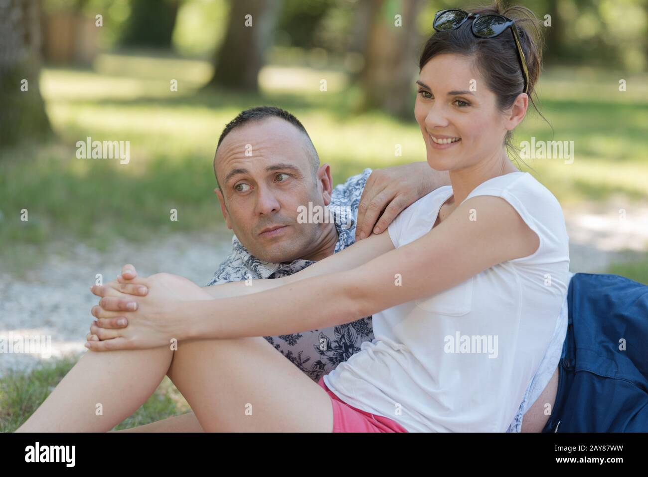 picture of couple observing a scene at the park Stock Photo - Alamy