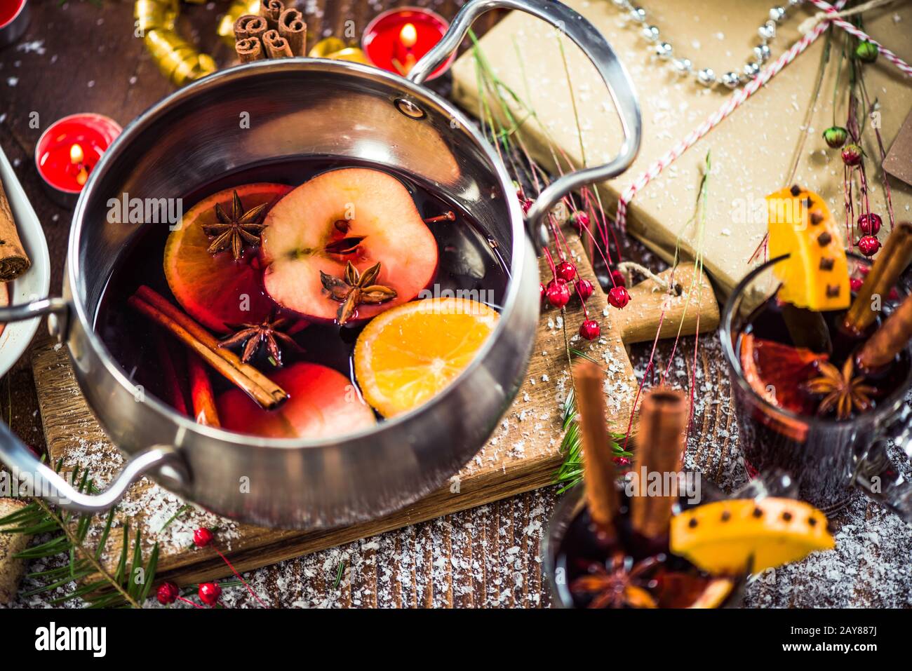Serving mulled hot warming wine Stock Photo - Alamy