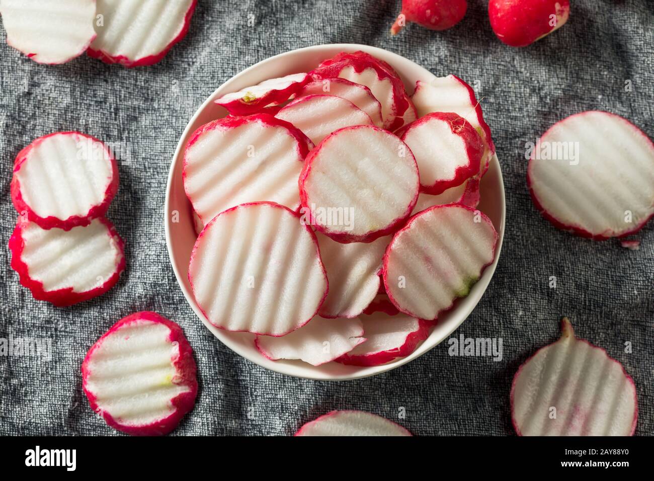 Raw Organic Radish Chips Slices Ready to Eat Stock Photo - Alamy