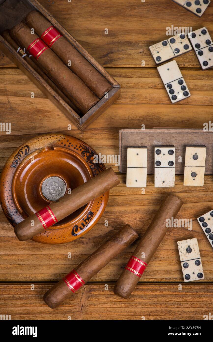 Cuban cigars and traditional domino game Stock Photo - Alamy