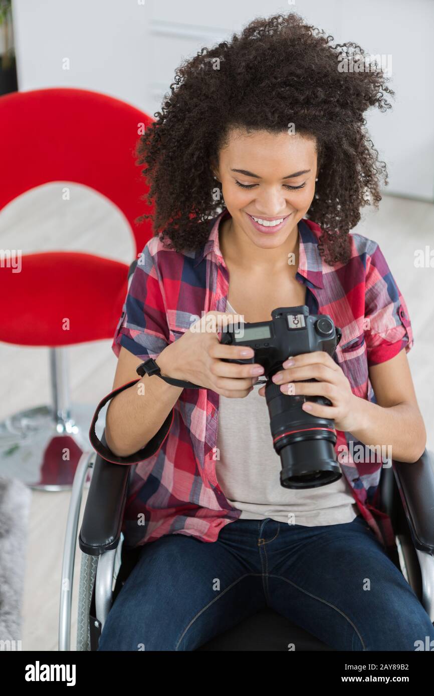 Female photographer in wheelchair hi-res stock photography and images ...