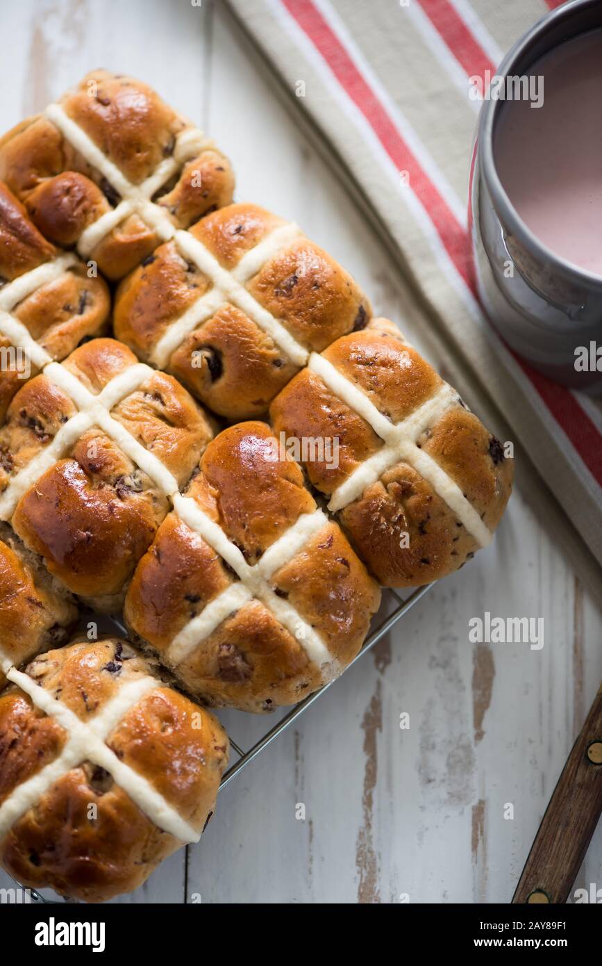 Fresh cross buns for breakfast Stock Photo - Alamy