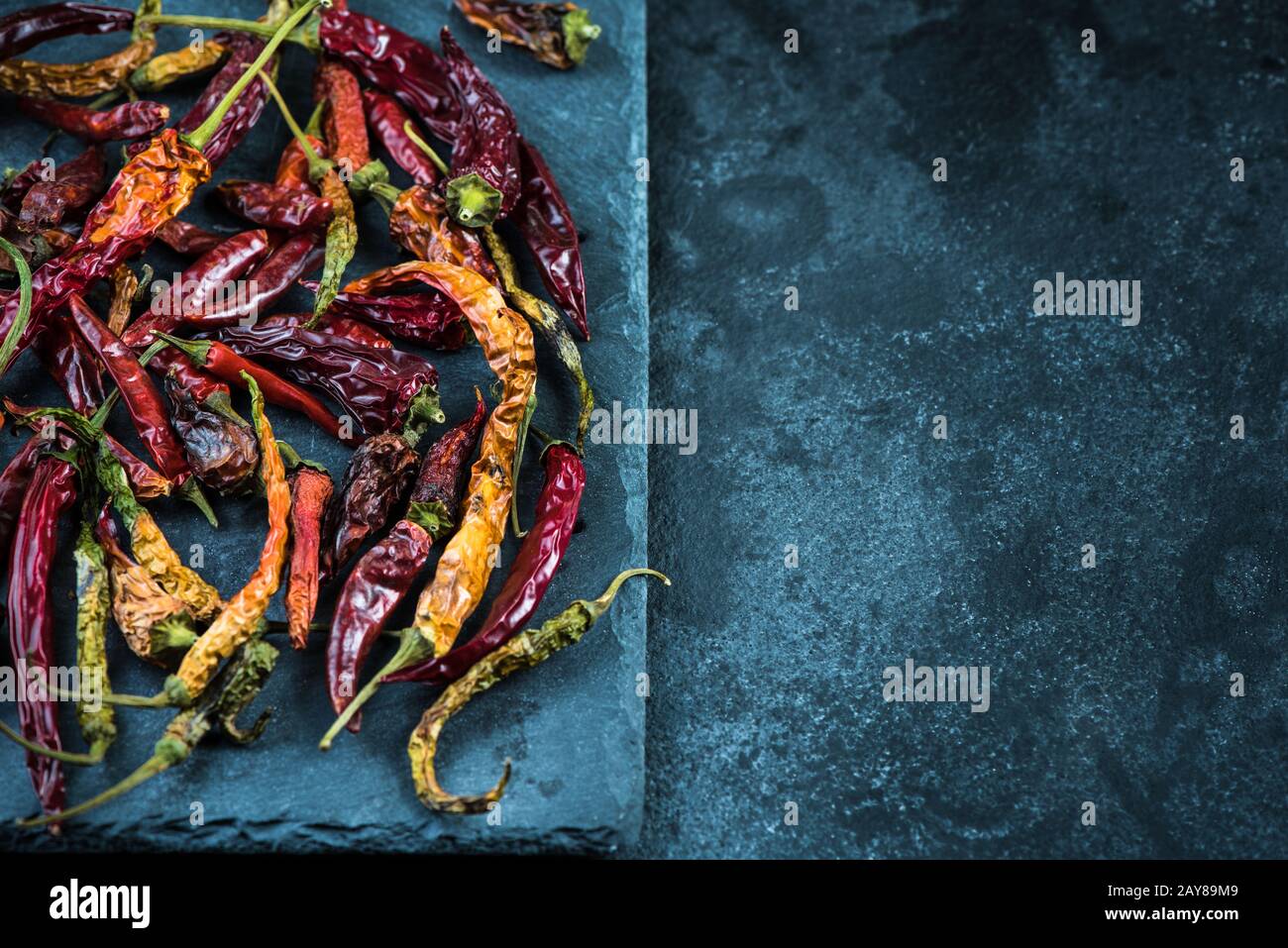 Dried hot peppers, food background Stock Photo - Alamy