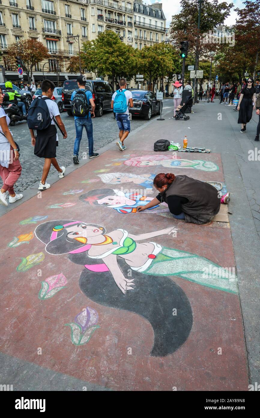 Pavement artist at work in Paris, France Europe Stock Photo - Alamy