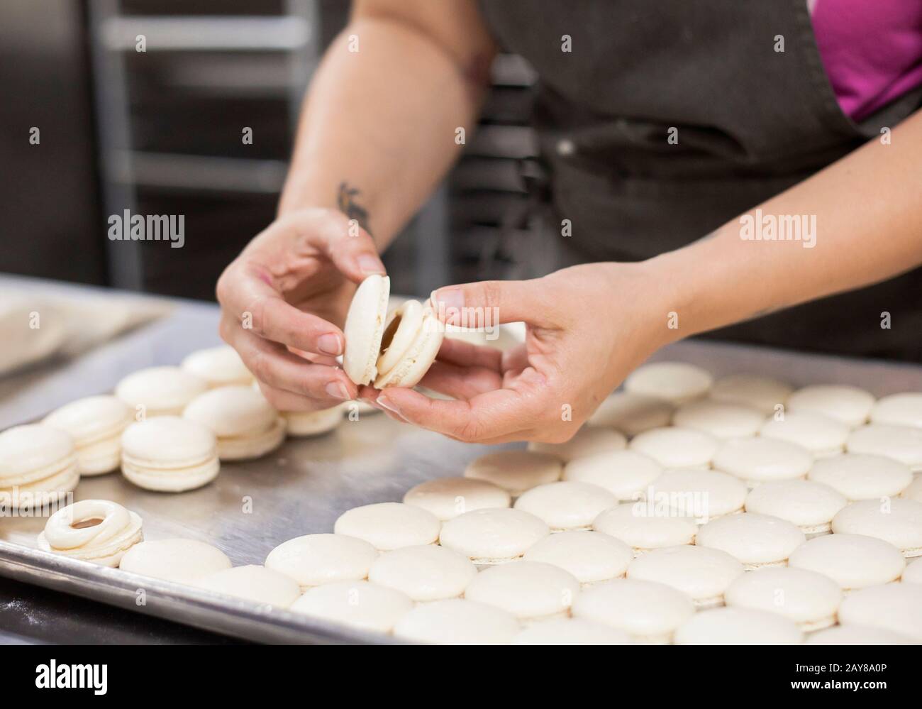 Sweets treats being made at a bakery Stock Photo - Alamy