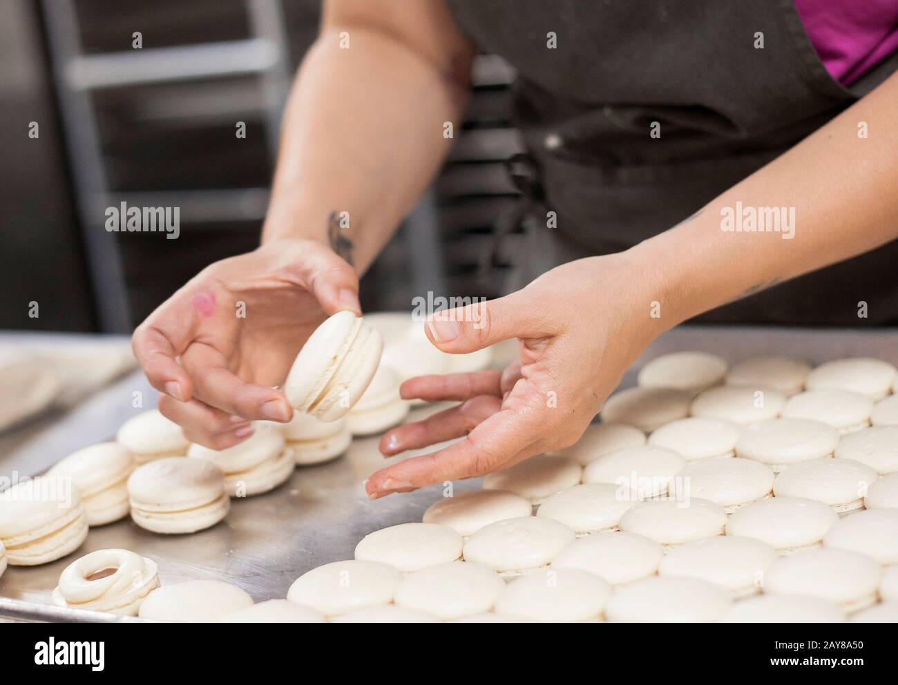 Sweets treats being made at a bakery Stock Photo - Alamy
