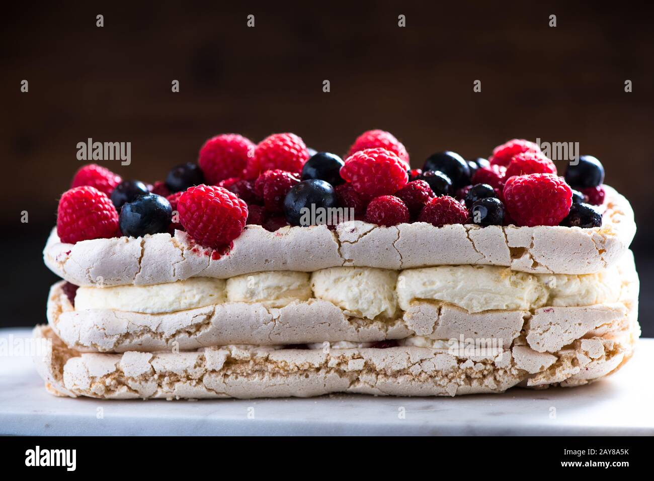 Pavlova with berry fruits Stock Photo - Alamy