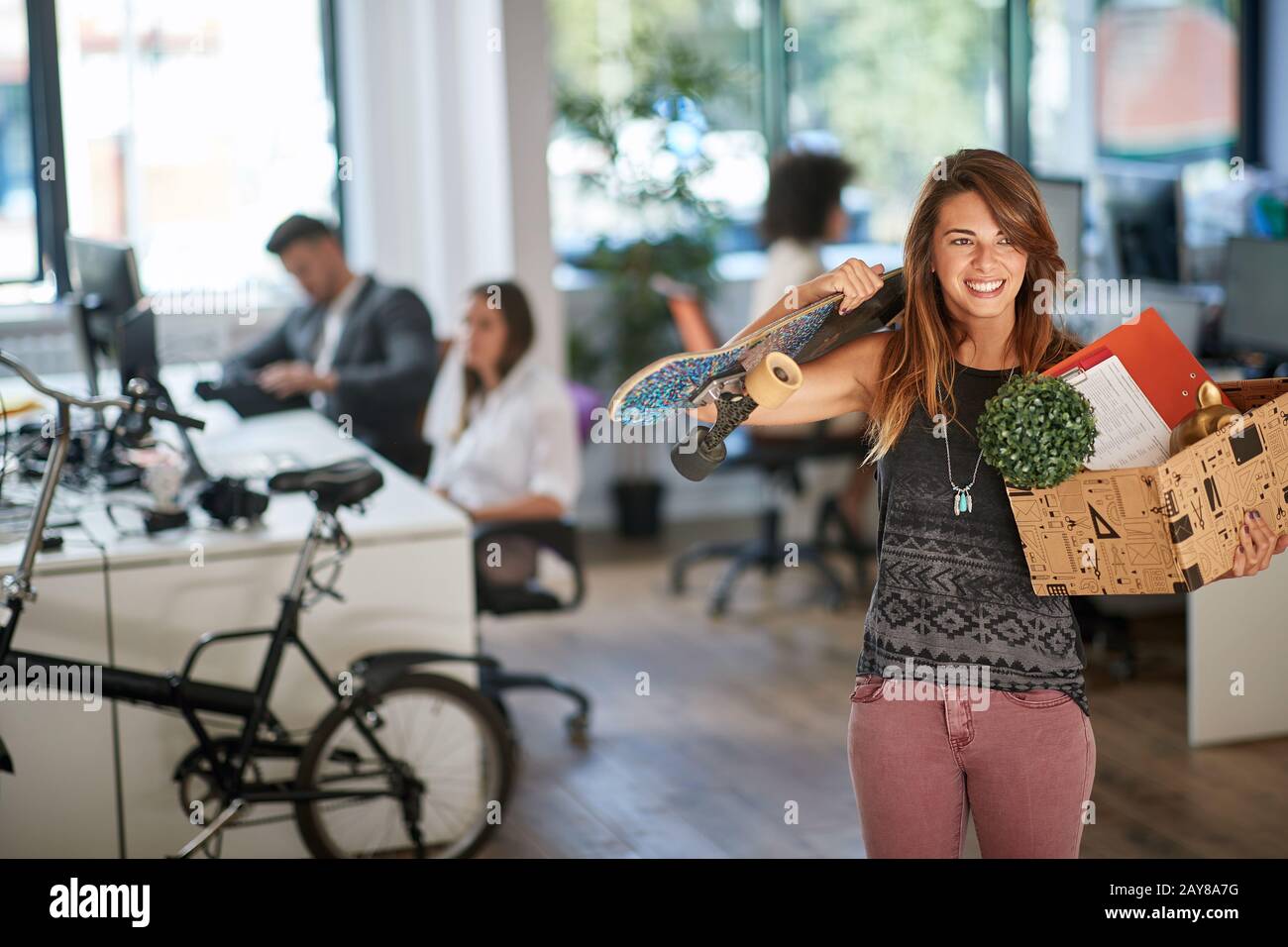 young female got hired and moving in the office. new job Stock Photo ...