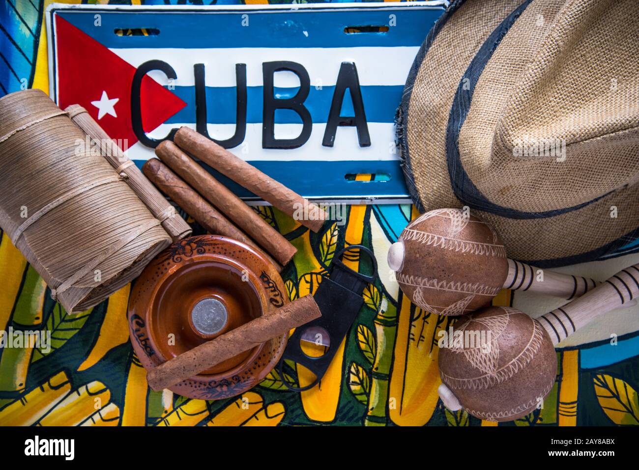 Cuban related items on vibrant background Stock Photo - Alamy