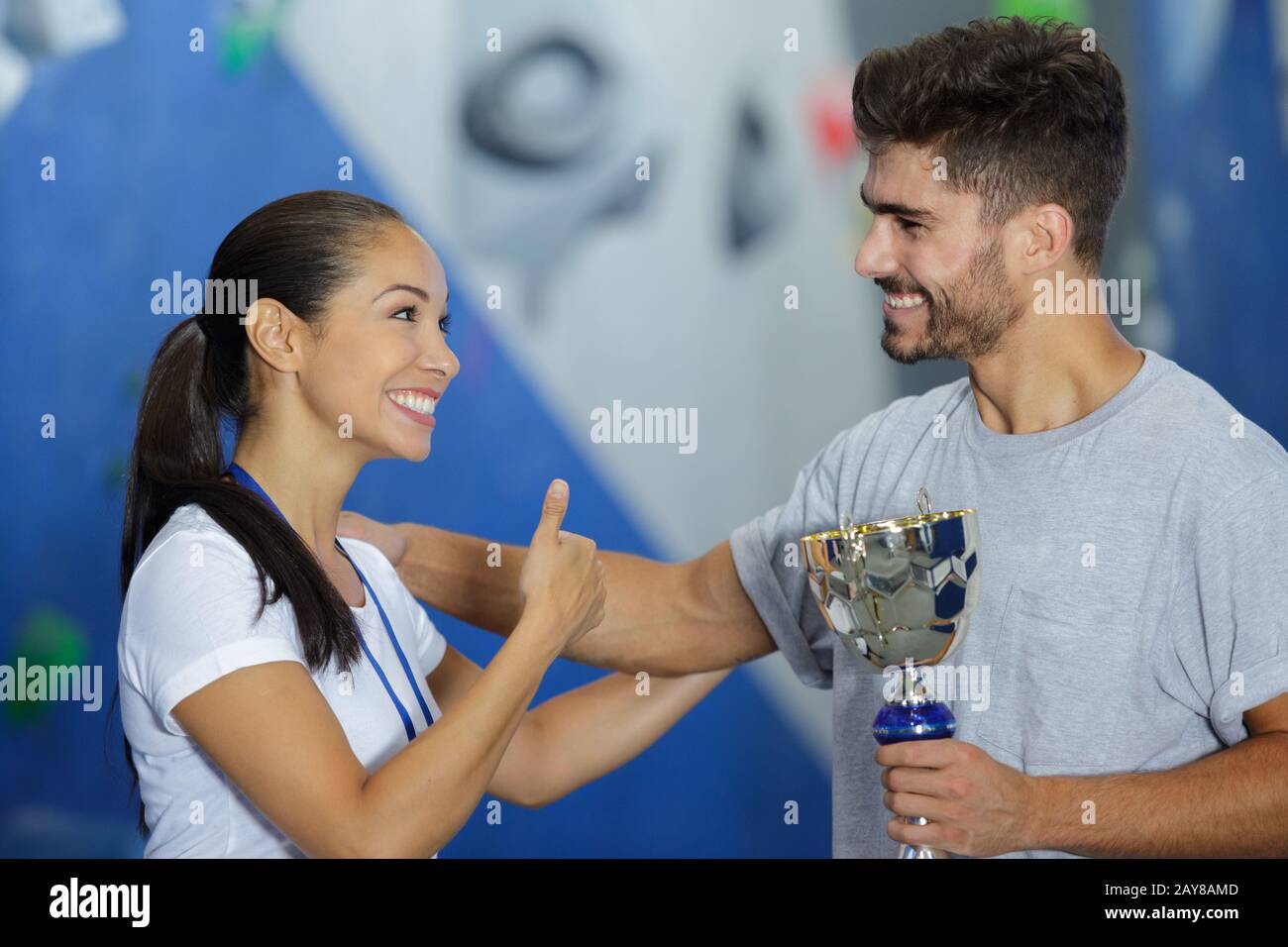 Hugging trophy hi-res stock photography and images - Alamy