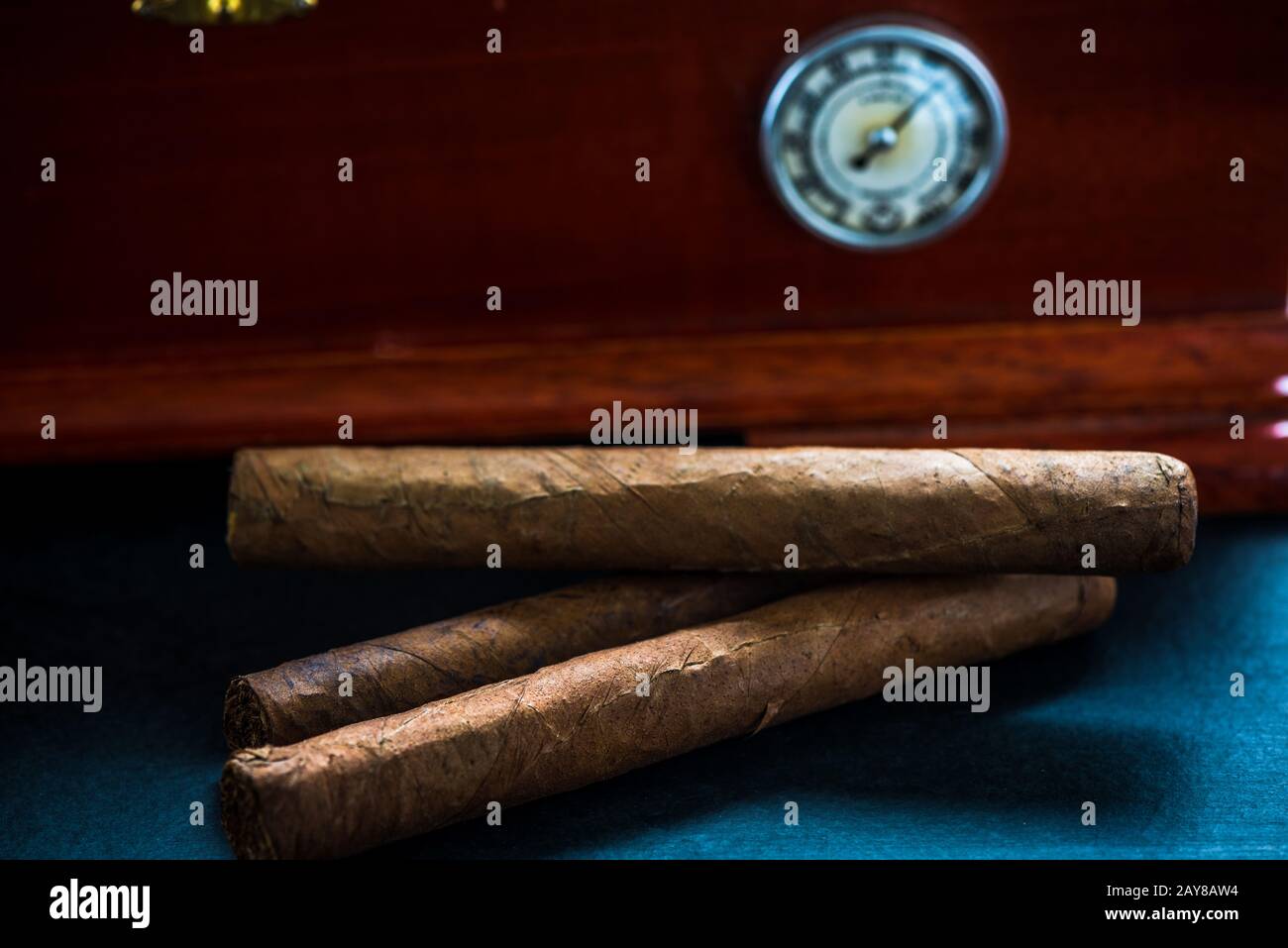 Cedar humidor and cigars Stock Photo - Alamy