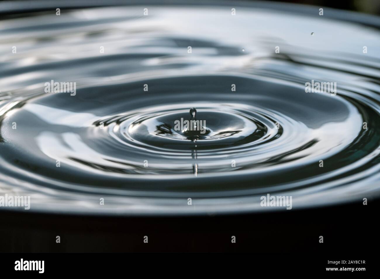 Water Drop splash with sun Stock Photo - Alamy