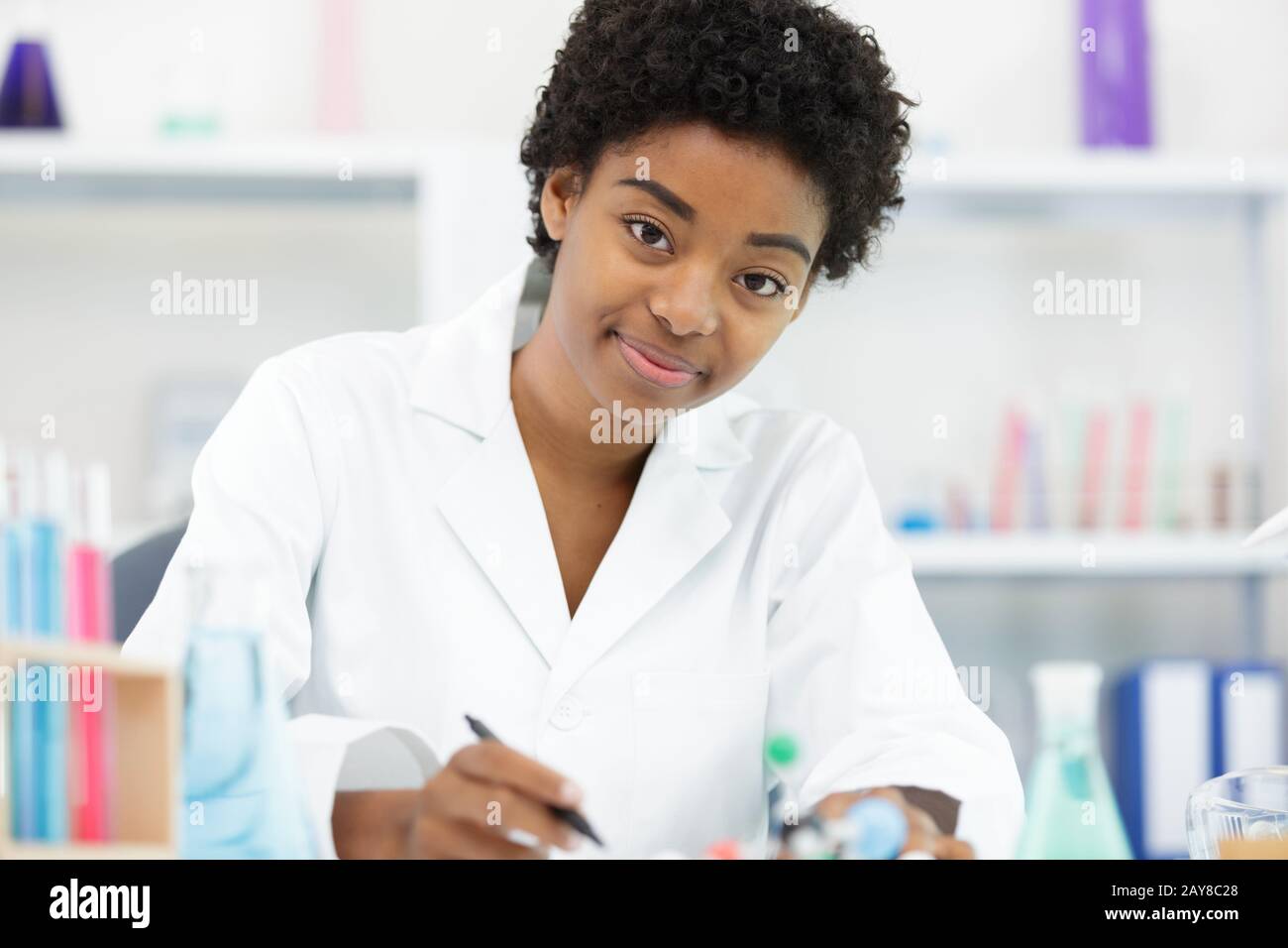 young medical student learning and writes in laboratory Stock Photo - Alamy