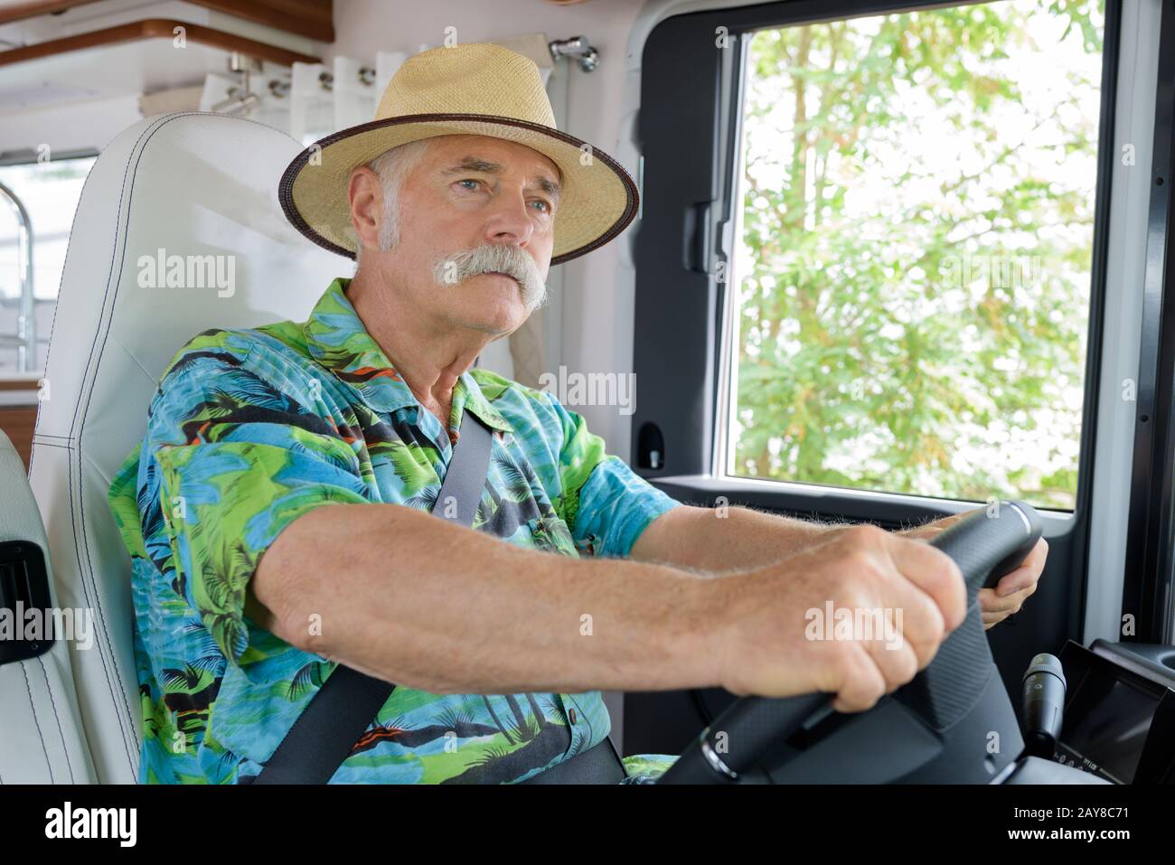 senior man driving camping car Stock Photo - Alamy