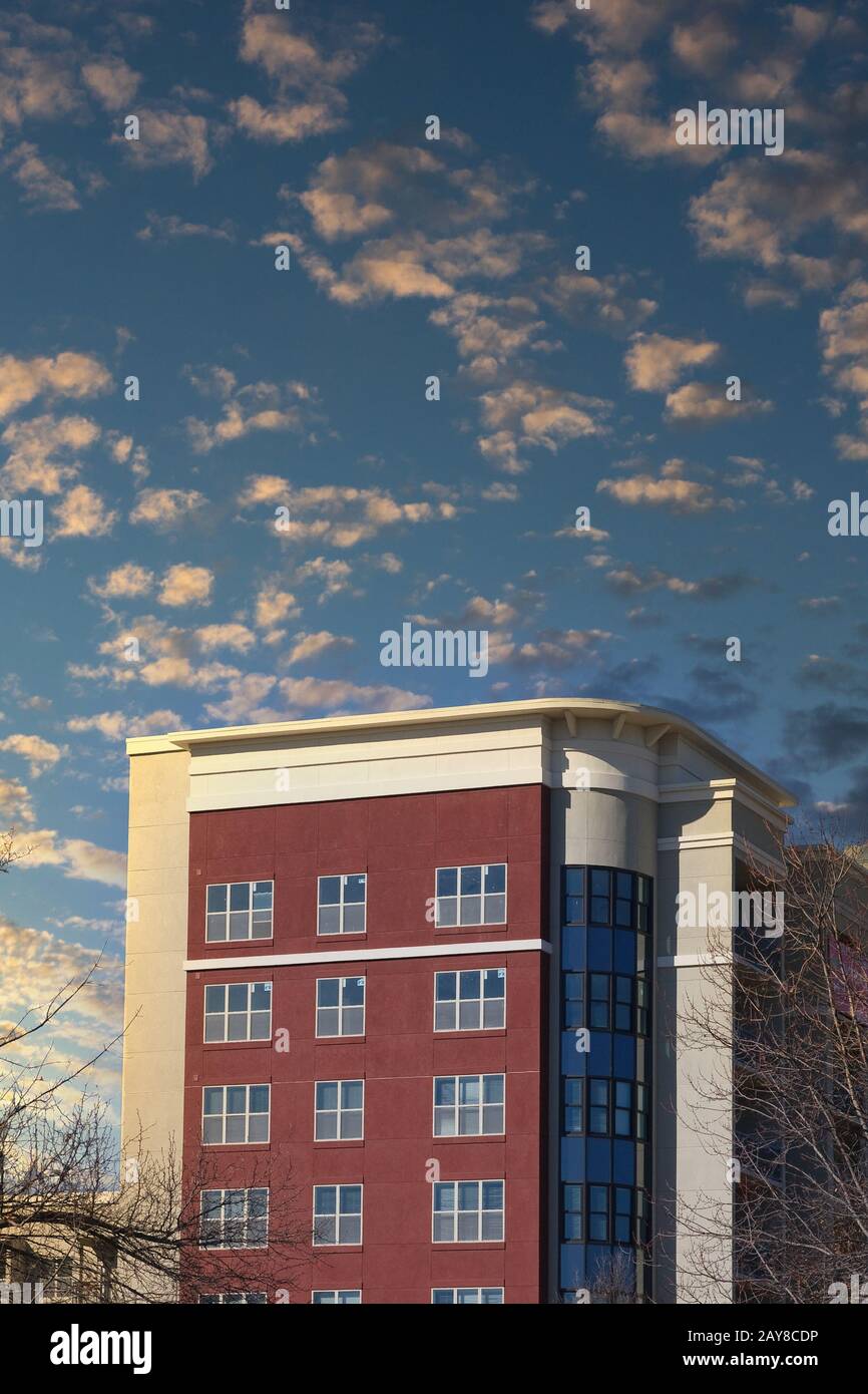 Red Brick Office Building on Dusk Sky Stock Photo - Alamy