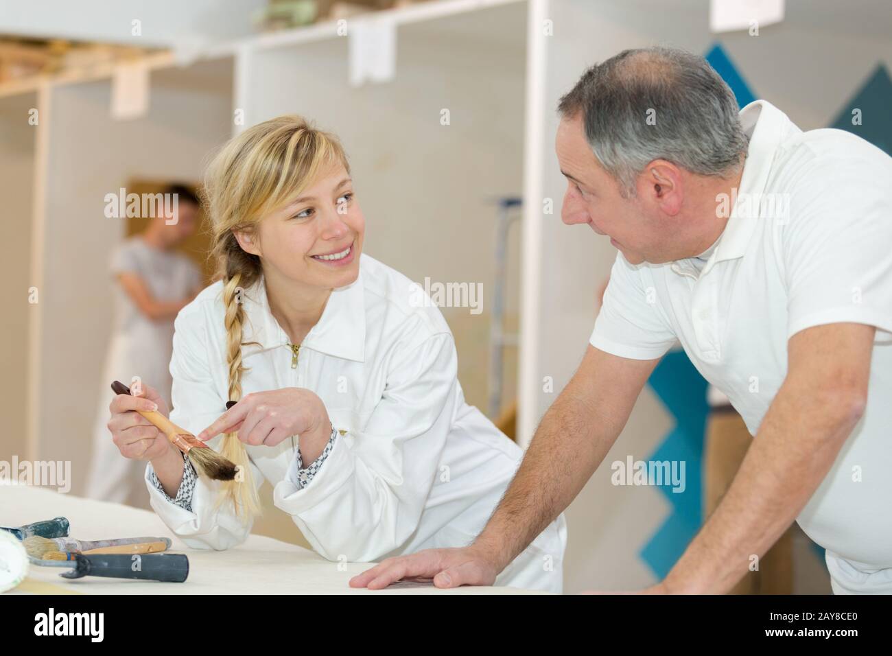 learning to paint with a brush Stock Photo - Alamy