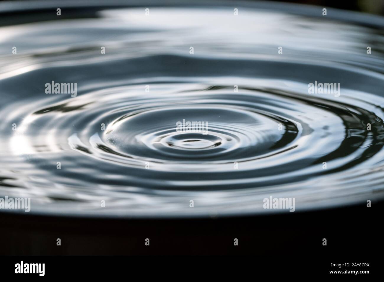 Water Drop splash with sun Stock Photo - Alamy