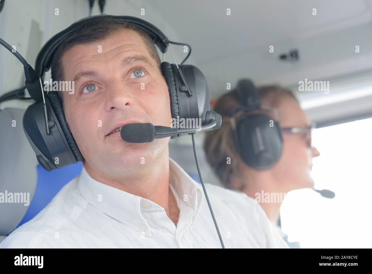 helicopter pilot in the cabin during the flight Stock Photo - Alamy
