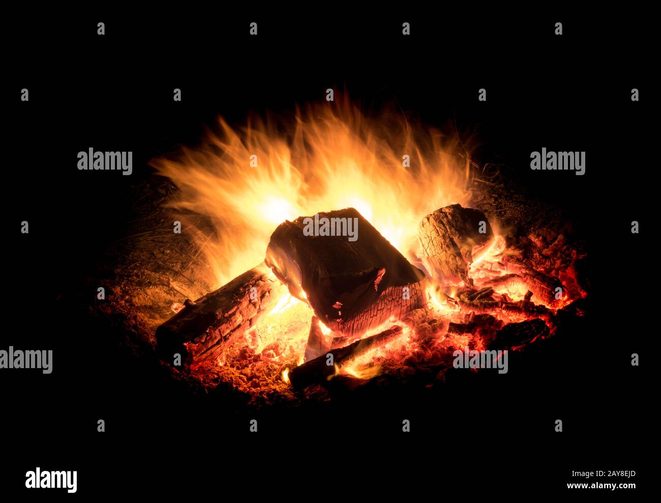 Bright burning fire with embers in front of black background Stock ...