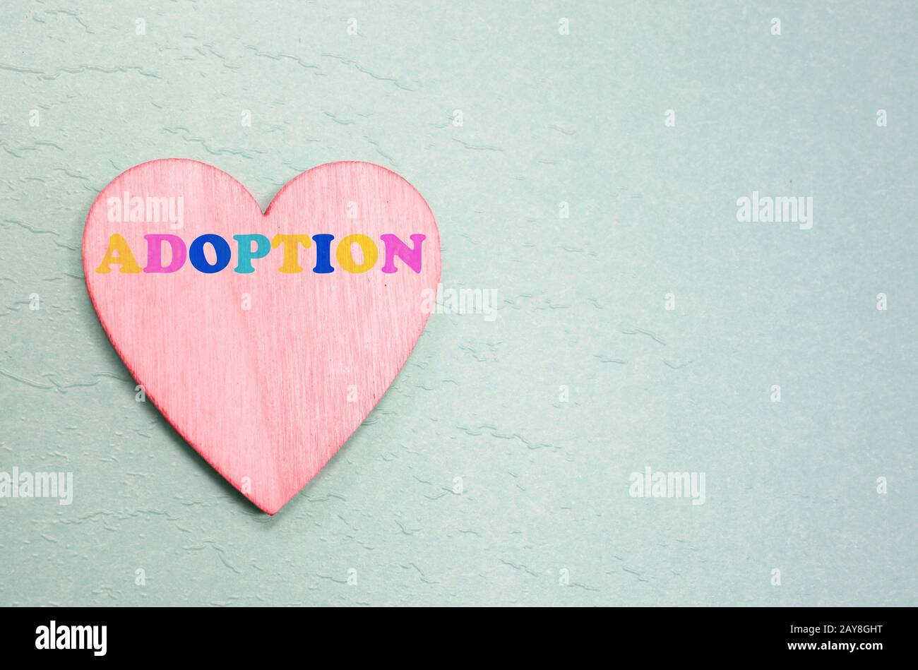 Pink adoption heart Stock Photo - Alamy