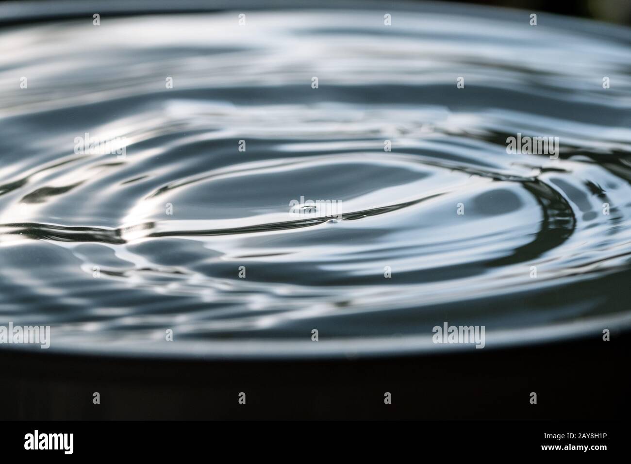 Water Drop splash with sun Stock Photo - Alamy