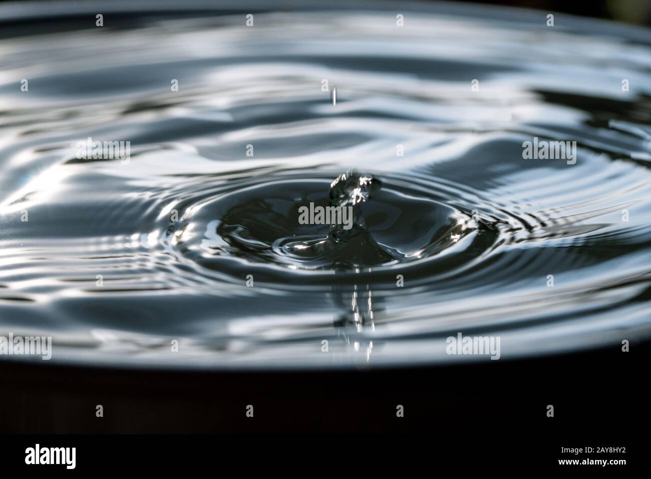 Water Drop splash with sun Stock Photo - Alamy