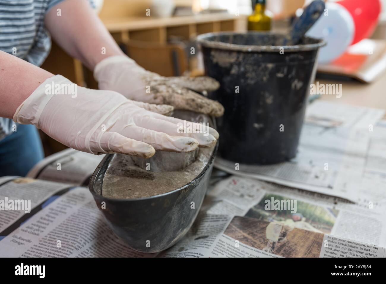 Making a shell from concrete mass yourself - close-up Stock Photo - Alamy