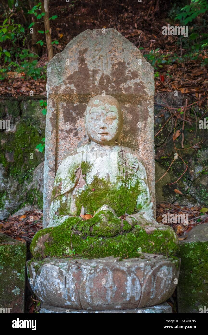 Buddha statue in Chion-in temple graveyard, Kyoto, Japan Stock Photo ...