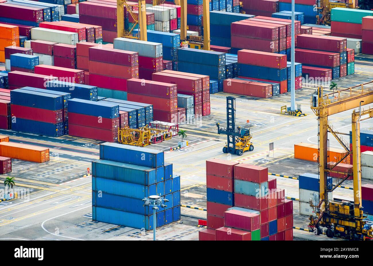 Freight containers in commercial port Stock Photo - Alamy