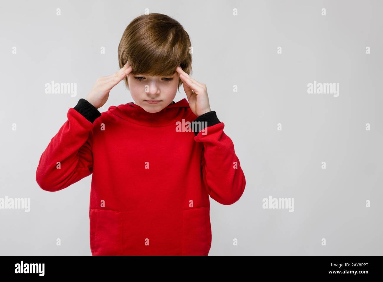 Sad teenage boy in fashionable clothes Stock Photo - Alamy