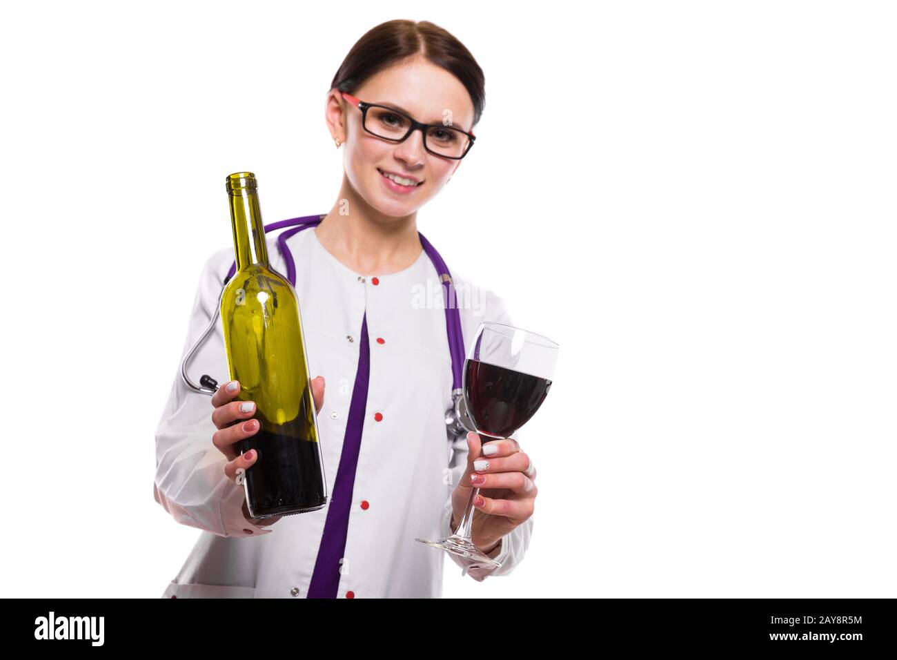 Young beautiful woman doctor with stethoscope offering wine in white ...