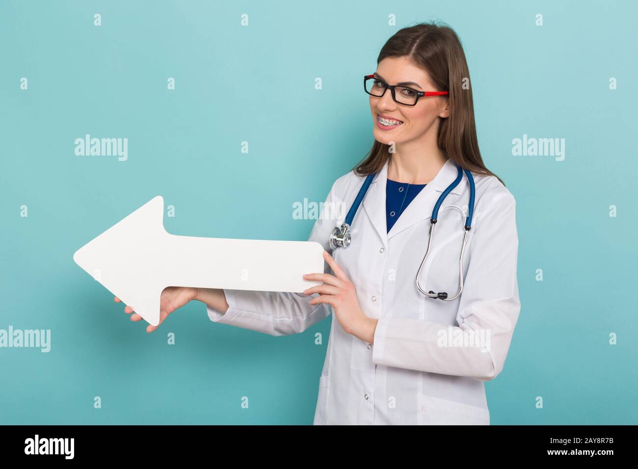 Female doctor with paper pointer Stock Photo - Alamy