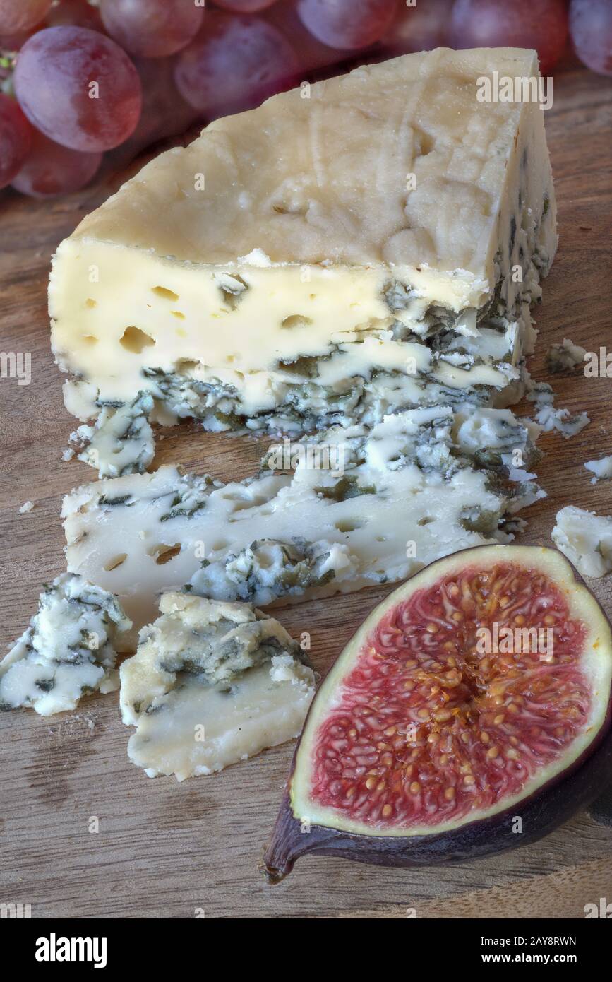 Roquefort cheese with fig and grapes Stock Photo - Alamy