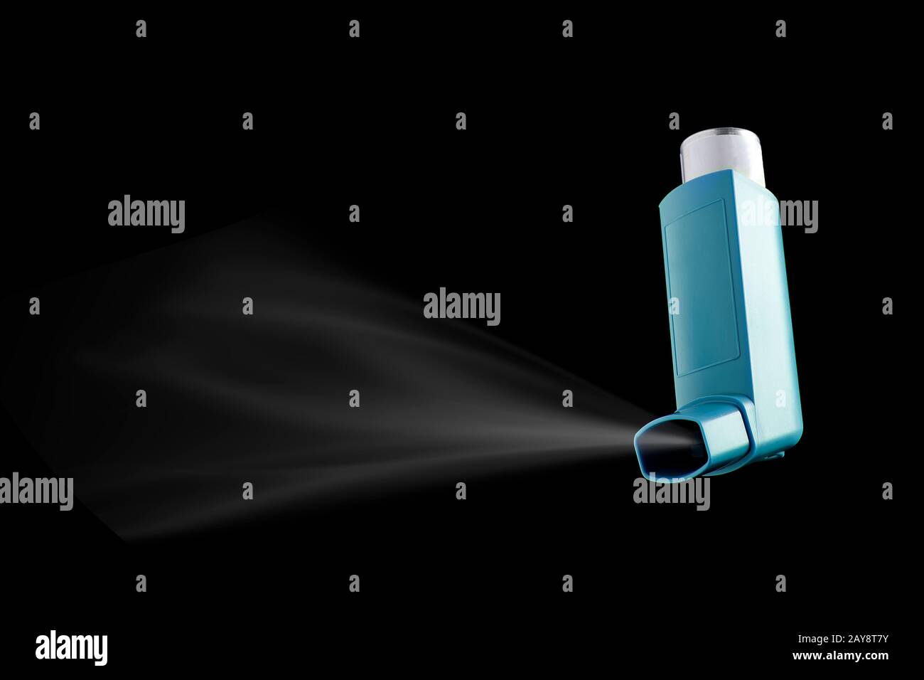 Salbutamol Blue MDI Inhaler being pushed over black background. Asthma ...