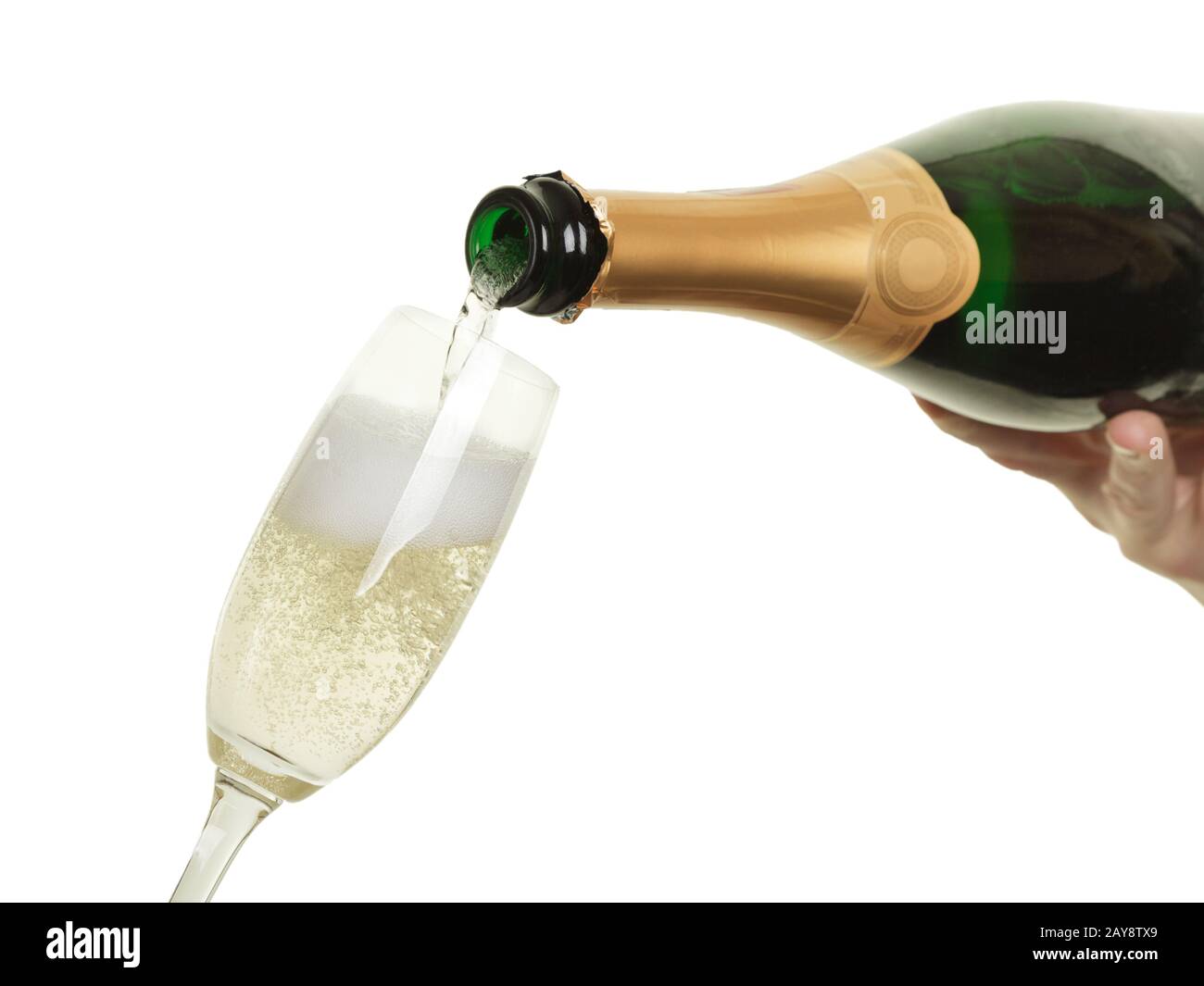Pouring in sparkling champagne into a glass Stock Photo - Alamy