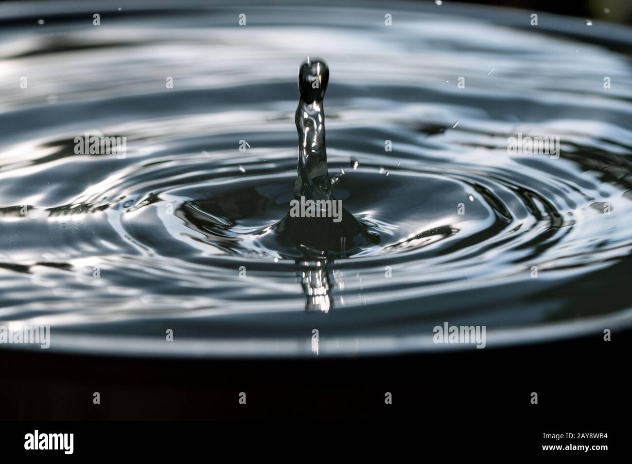 Water Drop splash with sun Stock Photo - Alamy