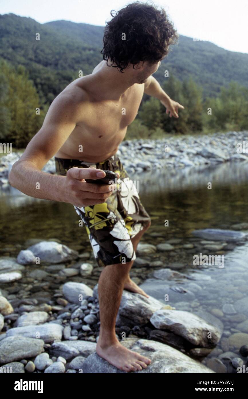 Stone thrower, bouncing stone Stock Photo - Alamy