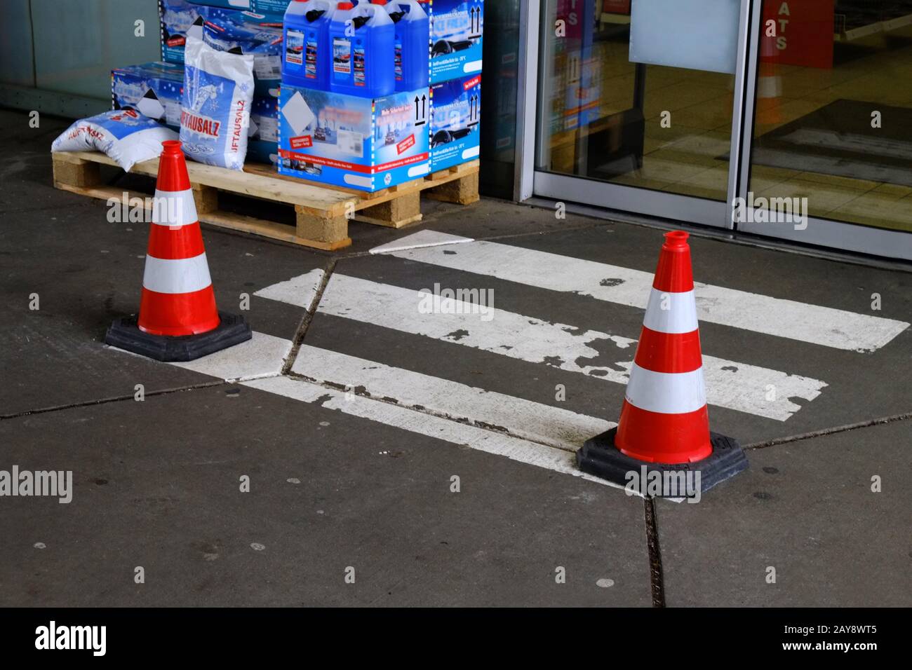Traffic cones and zebra crossing Stock Photo - Alamy
