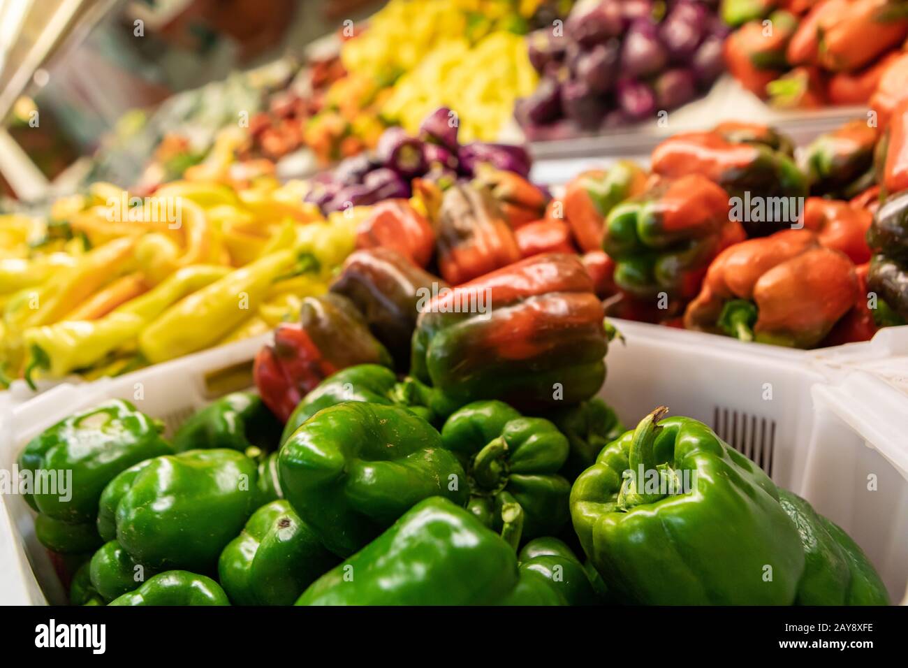 Close up of beautiful colored peppers of different colors. Green ...