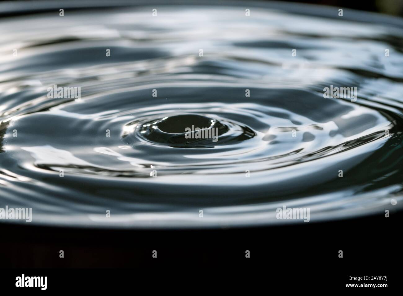 Water Drop splash with sun Stock Photo - Alamy