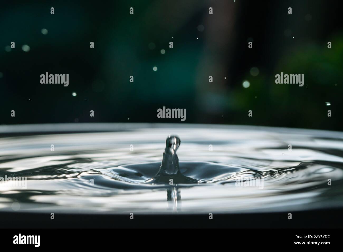 Water Drop splash with sun Stock Photo - Alamy