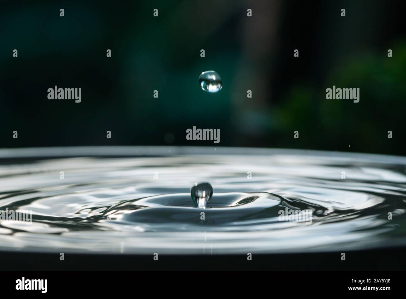 Water Drop splash with sun Stock Photo - Alamy