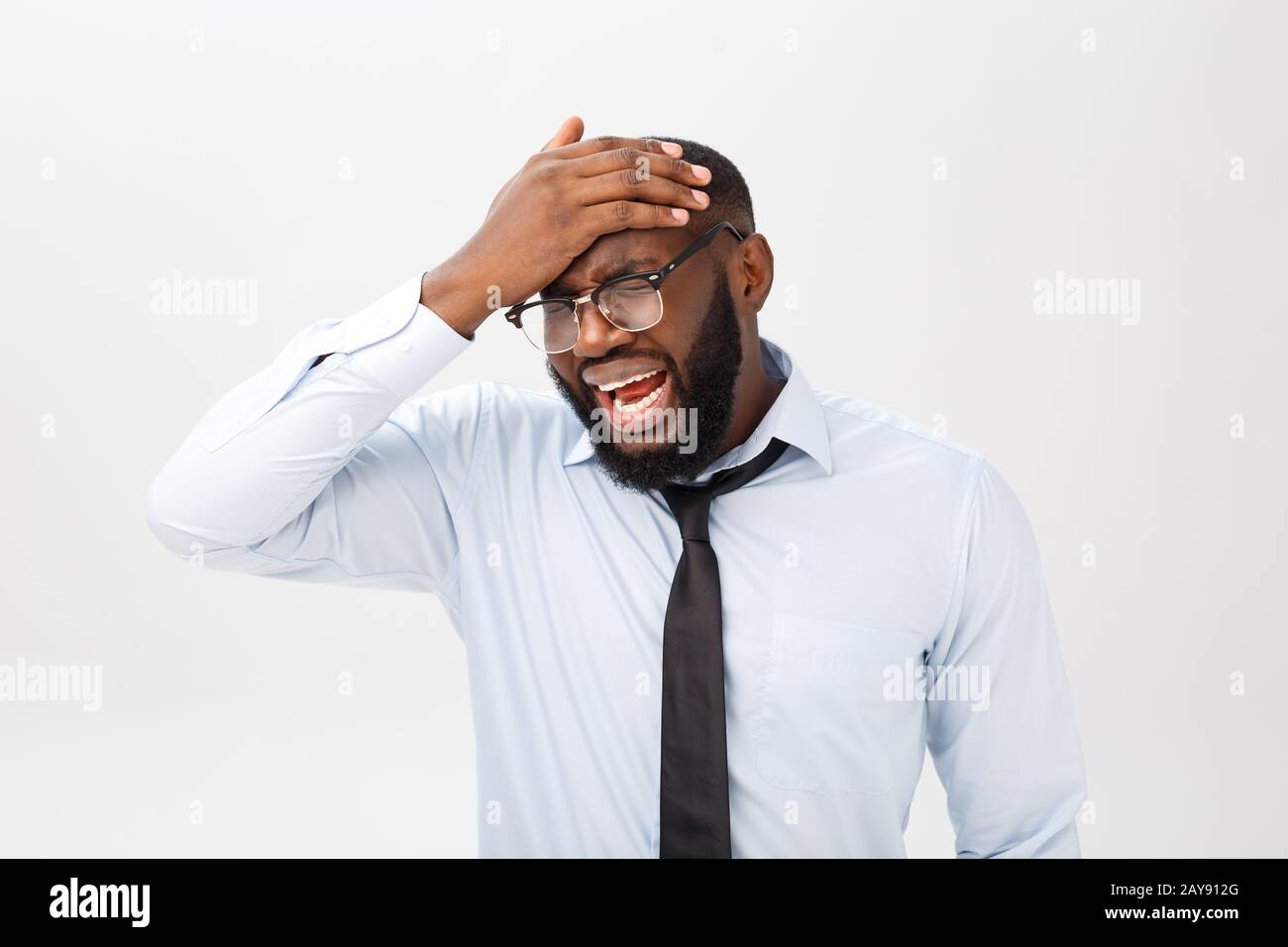 Portrait of desperate annoyed black male screaming in rage and anger ...