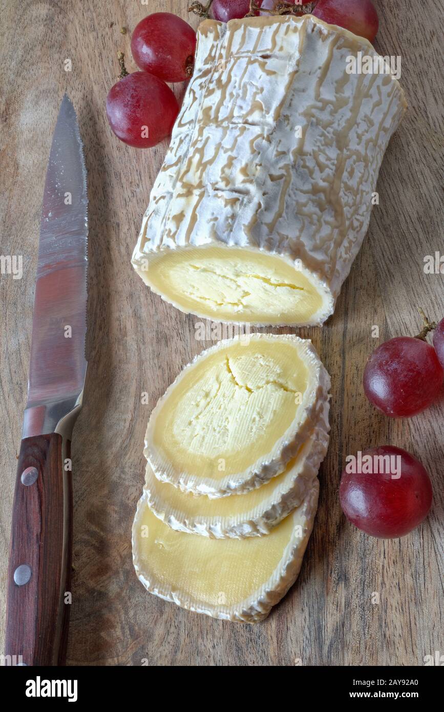 Mature Neufchâtel, French cheese from Normandy region Stock Photo - Alamy