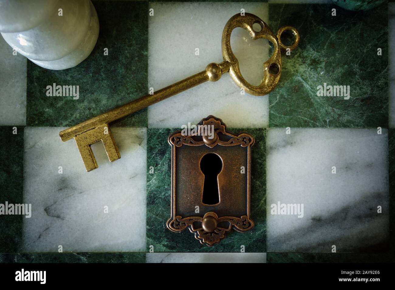 Lock and key chess Stock Photo - Alamy