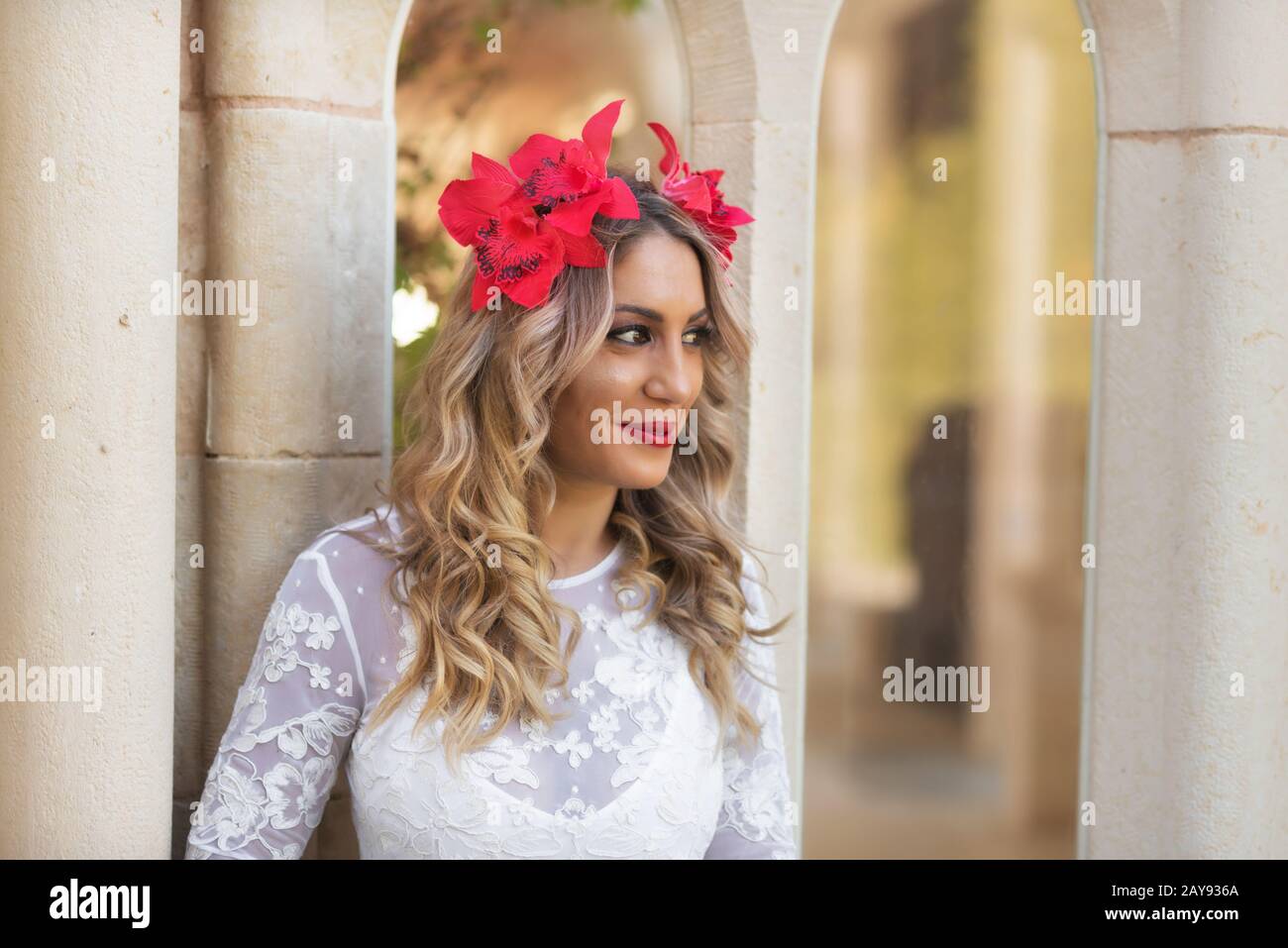 Portrait of beautiful blond girl in medieval dress with red diadem ...