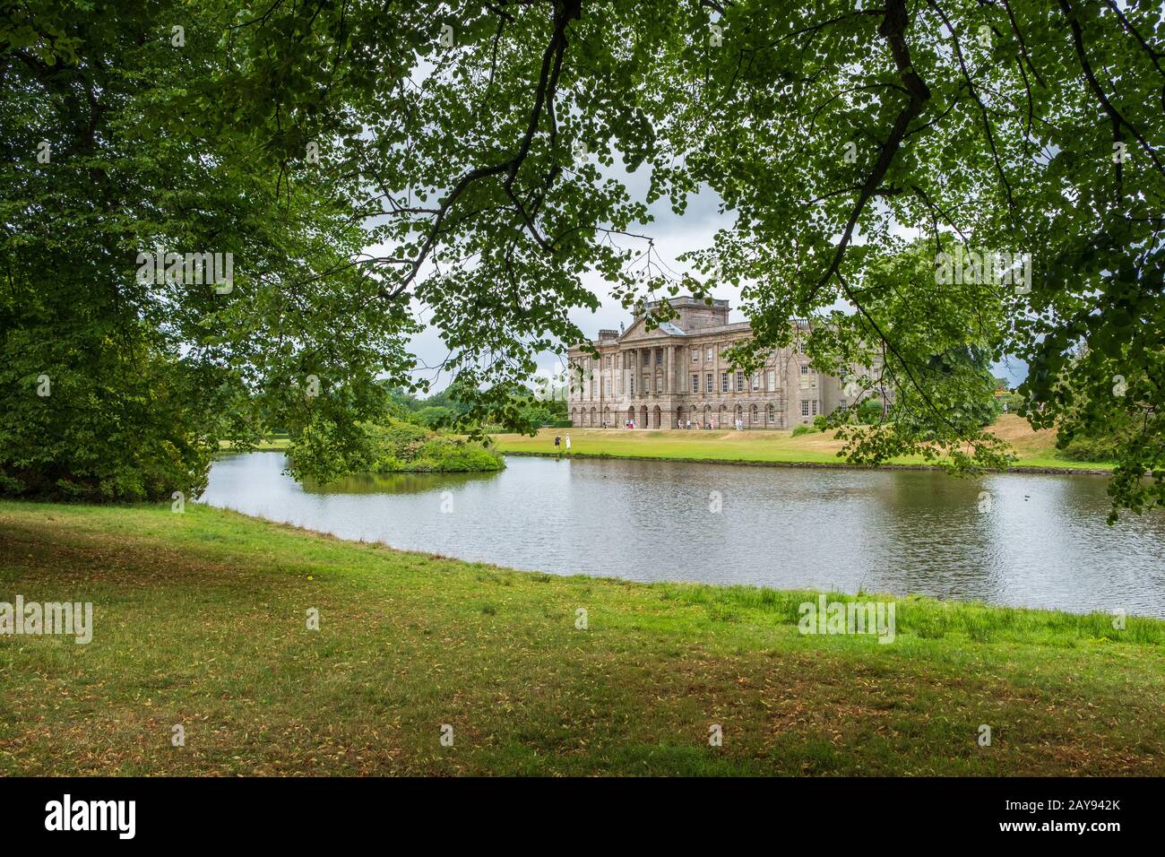 Lyme Hall and its pond inside Lyme Park in Cheshire, England Stock ...