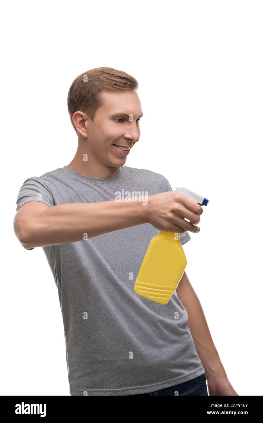Happy man with water sprayer isolated portrait Stock Photo - Alamy