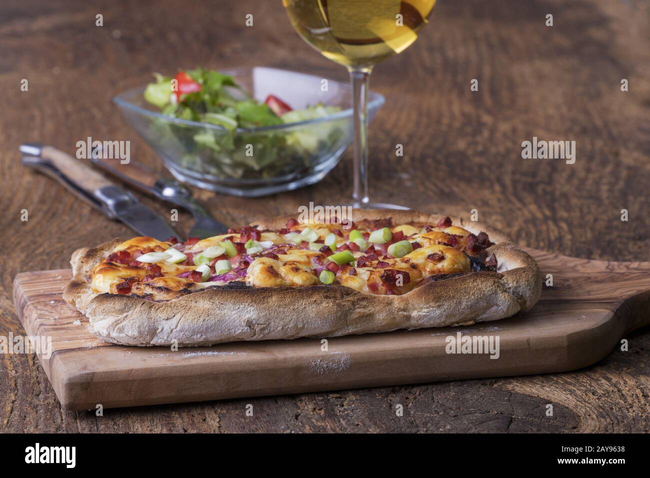 homemade French tarte flambée with wine Stock Photo - Alamy